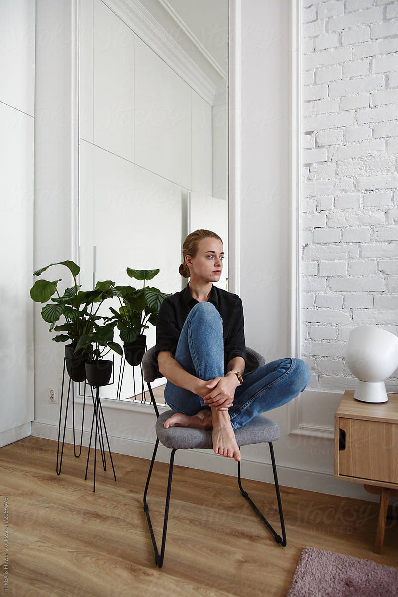 "Thoughtful Woman Sitting On Chair" by Stocksy Contributor "Danil ...