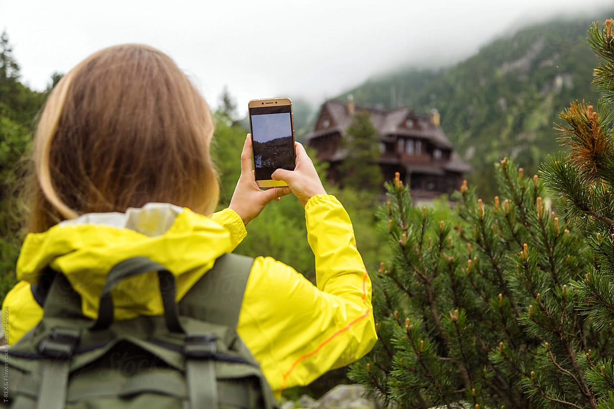 "Tourist Taking Picture Of House" by Stocksy Contributor "Danil Nevsky ...