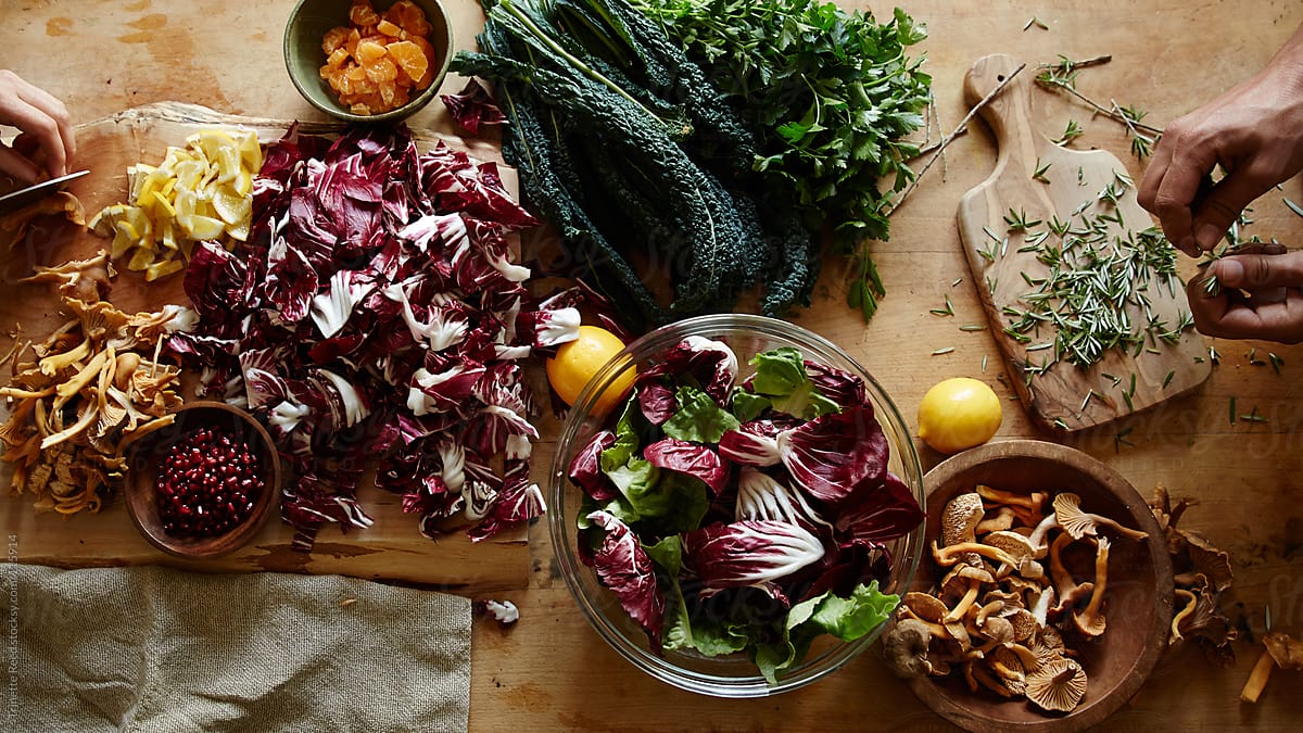 "Couple Cooking With Lots Of Vegetable Ingredients In The Kitchen" by ...
