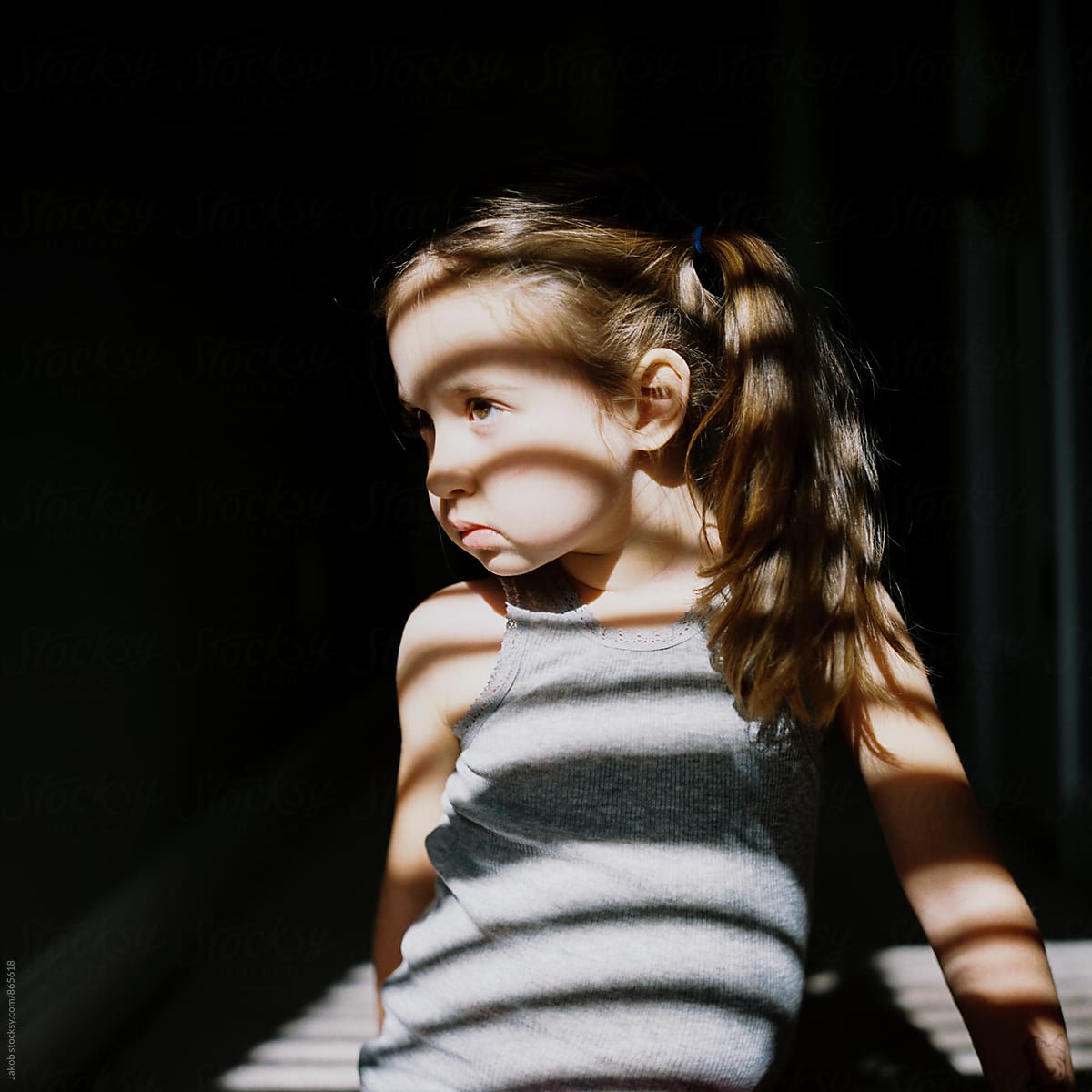 "Portrait Of A Beautiful Young Girl With Shadows Of Light" by Stocksy ...