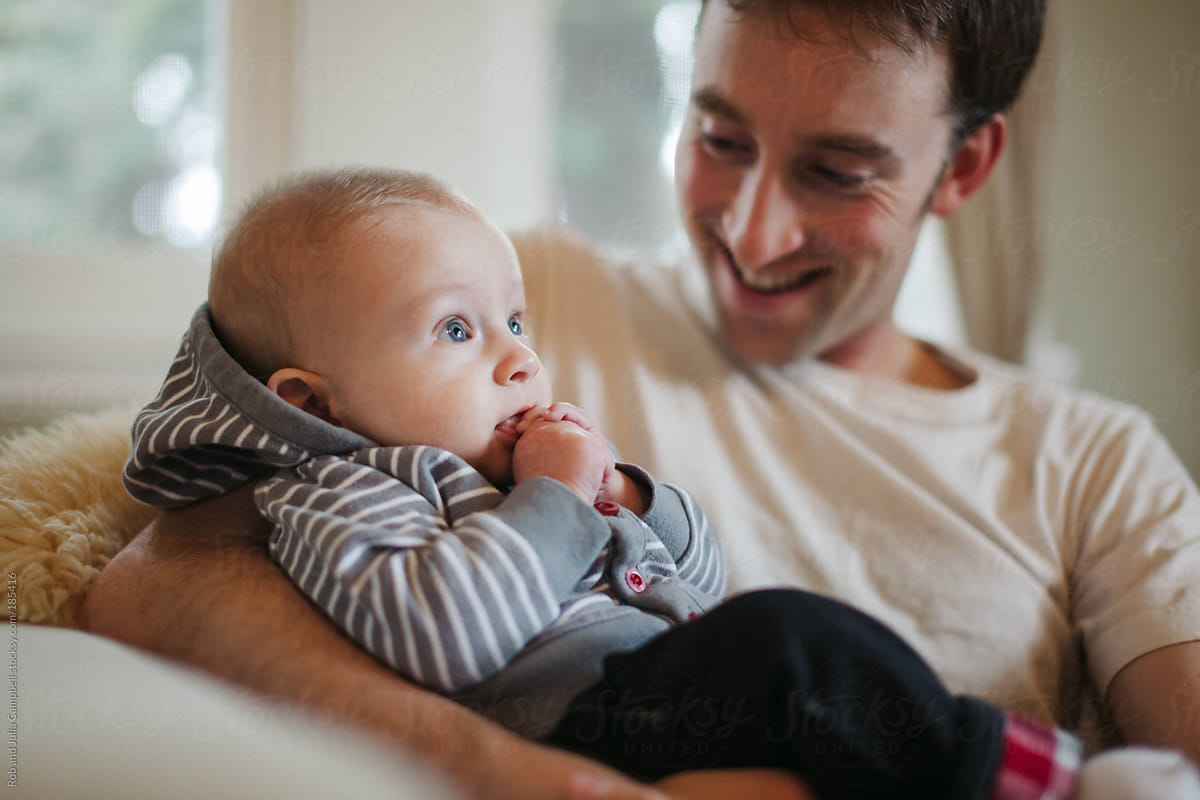 "Young Happy Father Sunggling With Cute Baby Boy" by Stocksy ...