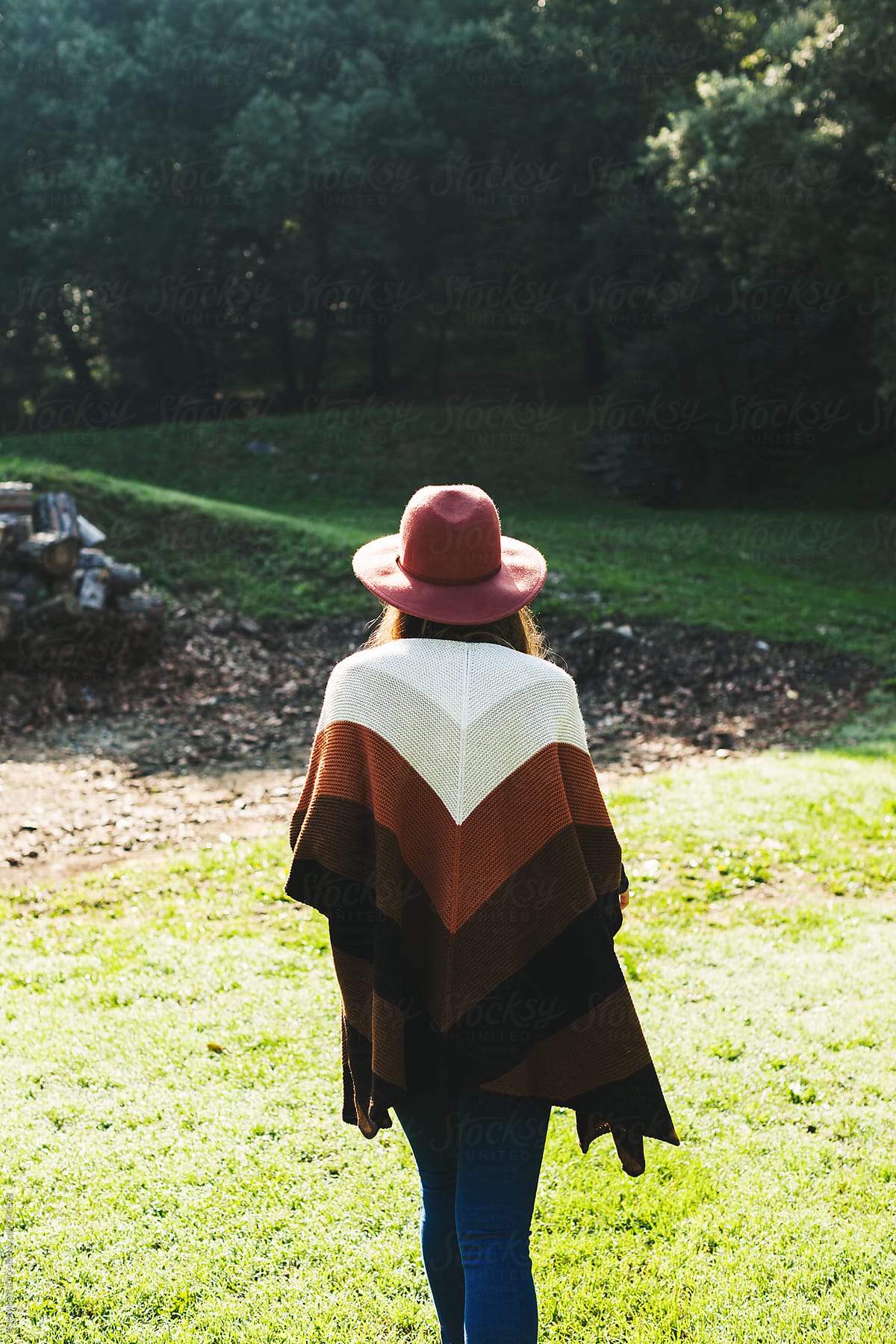 "Back View Of A Woman Walking In A Rural Landscape On Winter." by ...