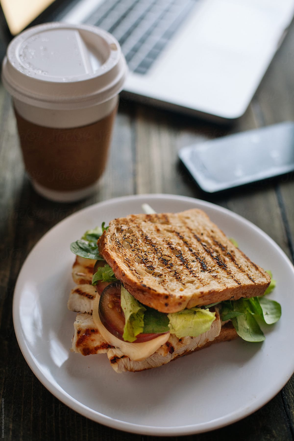 "Sandwich On A Office Desk" by Stocksy Contributor "Davide Illini ...