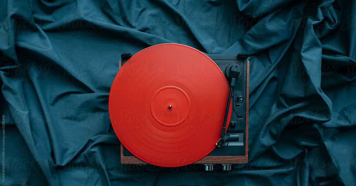 "Red Vinyl On A Turntable" by Stocksy Contributor "THAIS RAMOS VARELA ...