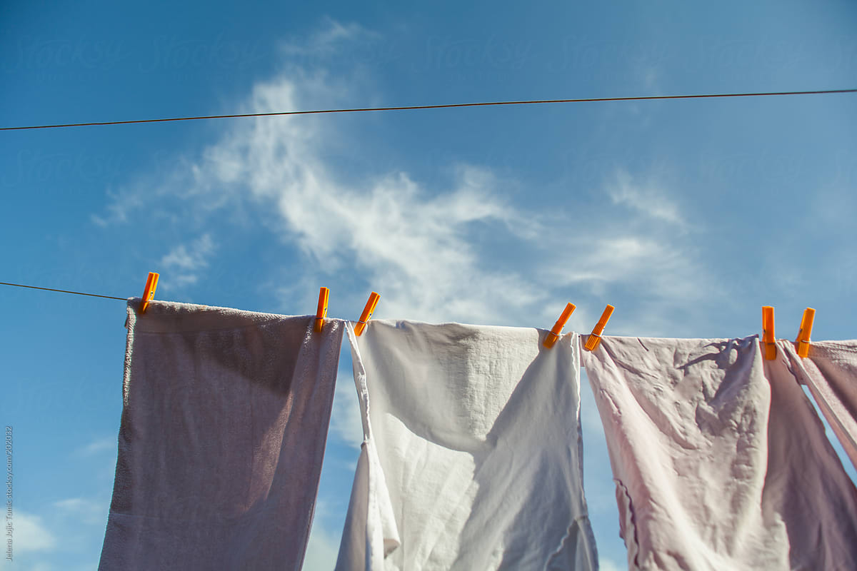 "Drying Laundry On The Clothesline" by Stocksy Contributor "Jelena ...