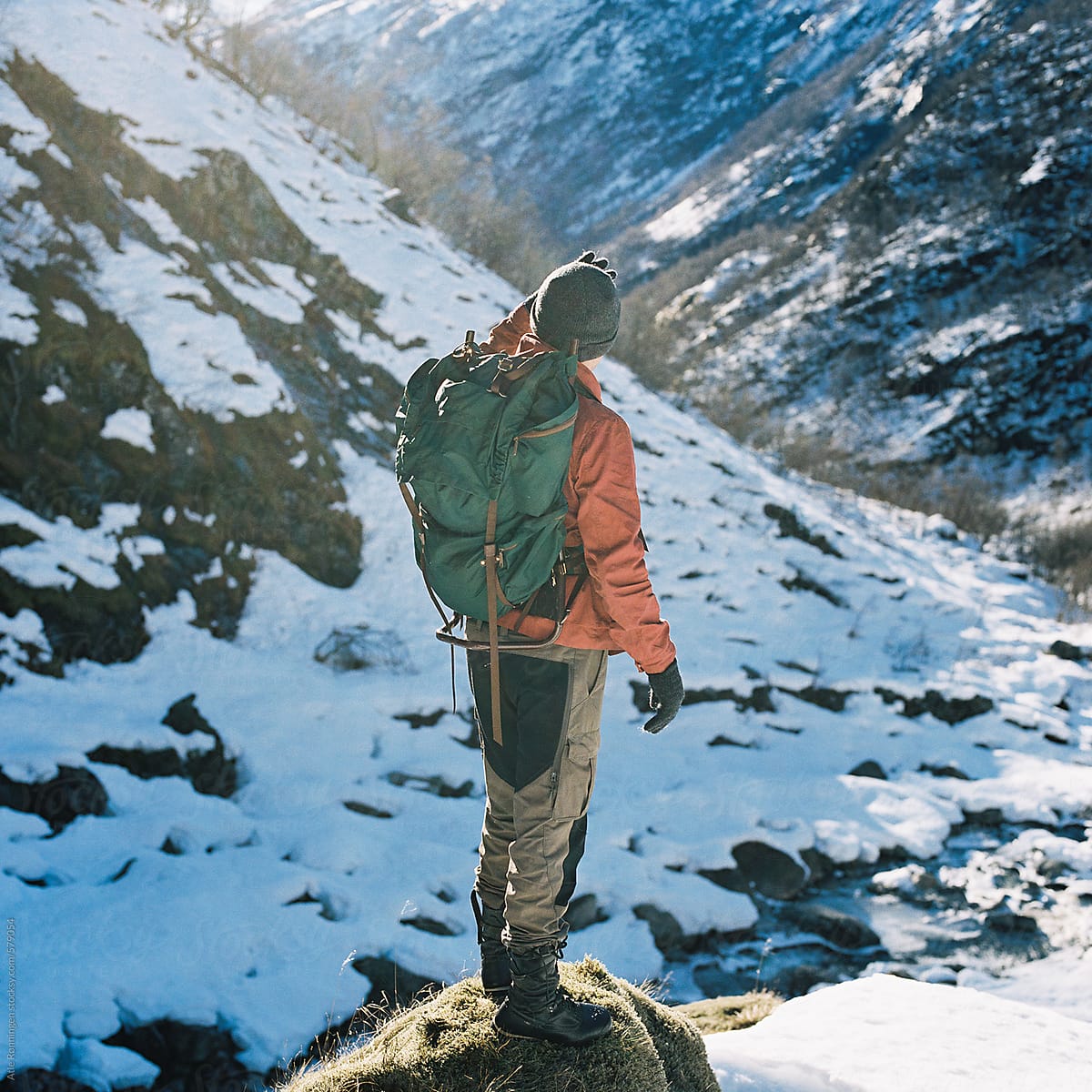 "Young Man In Red Outdoor Jacket Scouting Over The Valley Of Norway" by ...