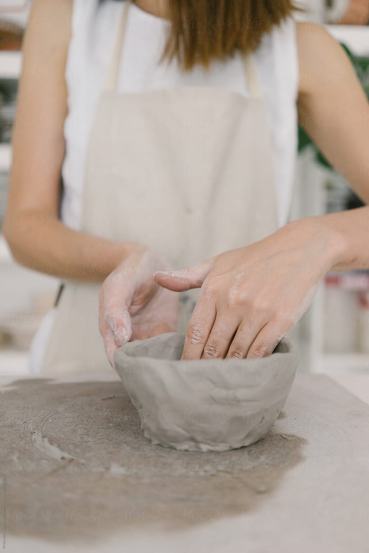 "Ceramicist Making A Bowl" by Stocksy Contributor "Bruce And Rebecca ...