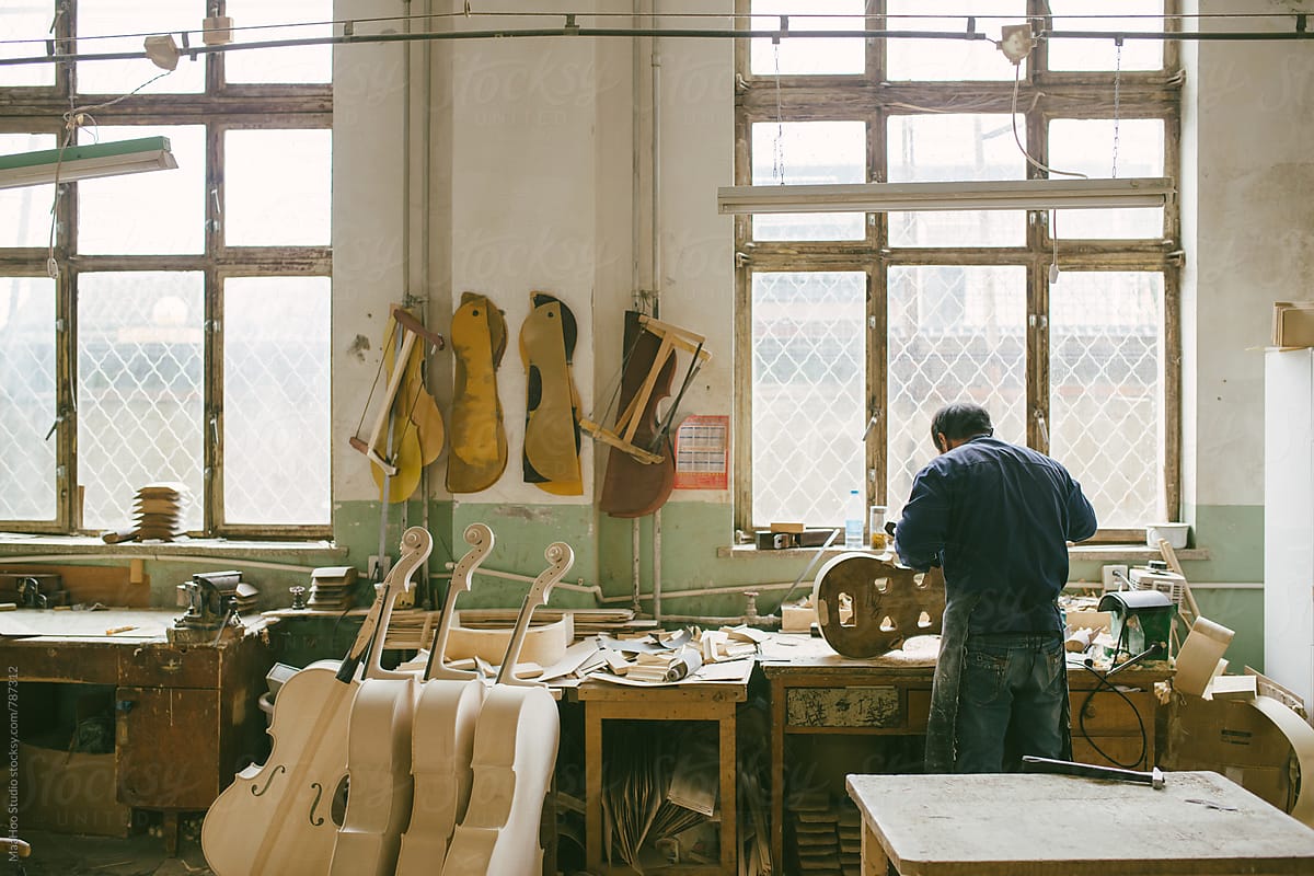 "Violoncello Maker At Work" by Stocksy Contributor "MaaHoo" - Stocksy
