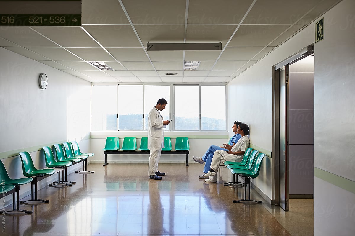 "Group Of Staff Hospital People Talking And Relaxing In Break Moment At ...