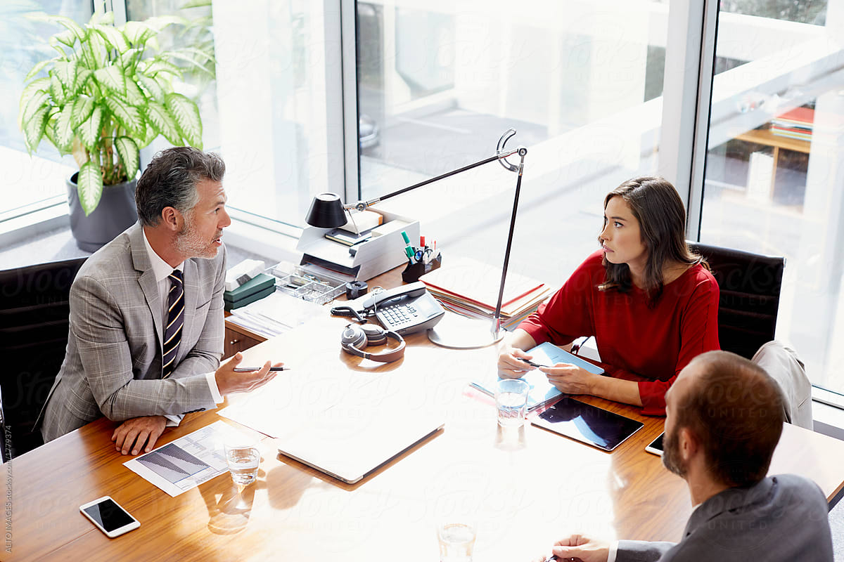 "Business People Planning At Table In Office" by Stocksy Contributor ...