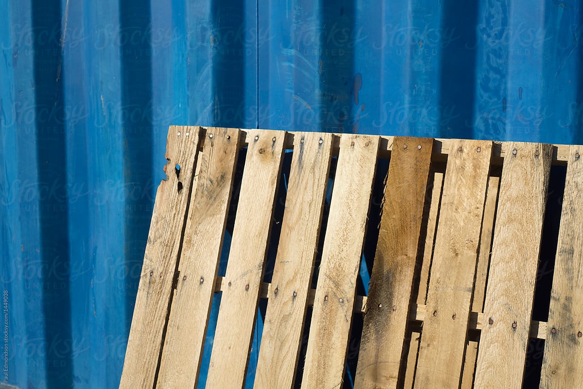 "Shipping Pallet Leaning Against Cargo Container" by Stocksy ...