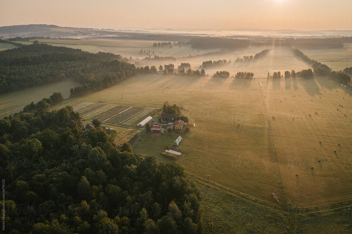 "Farm From High Above" by Stocksy Contributor "Martin Matej" - Stocksy