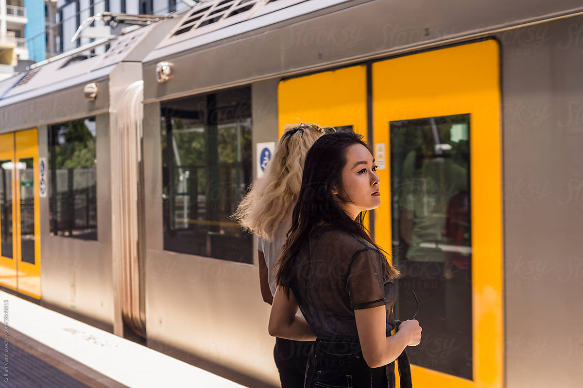 "Friends Getting On The Train" by Stocksy Contributor "Gillian Vann ...