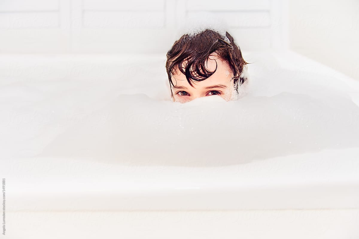 "Boy Submerged In A Deep Bubble Bath" by Stocksy Contributor "Angela ...