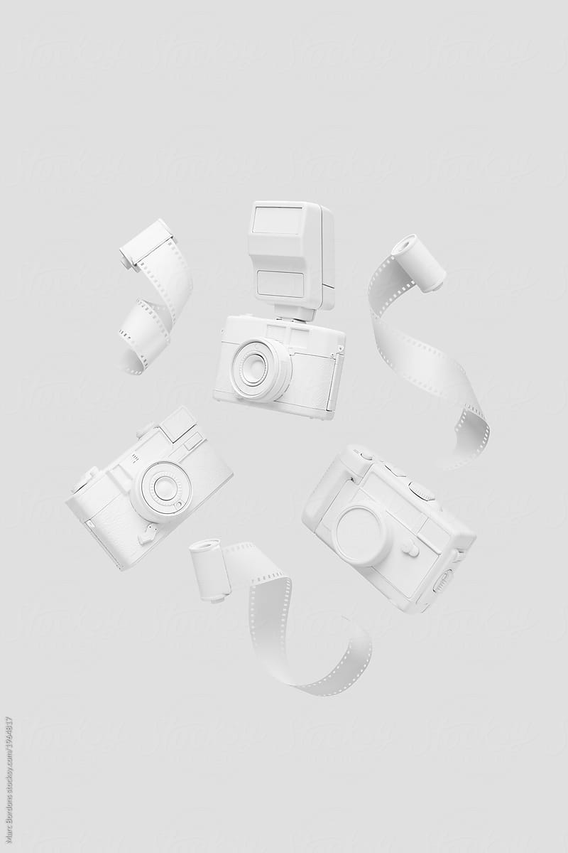 "White Camera And Film" by Stocksy Contributor "Marc Bordons" - Stocksy