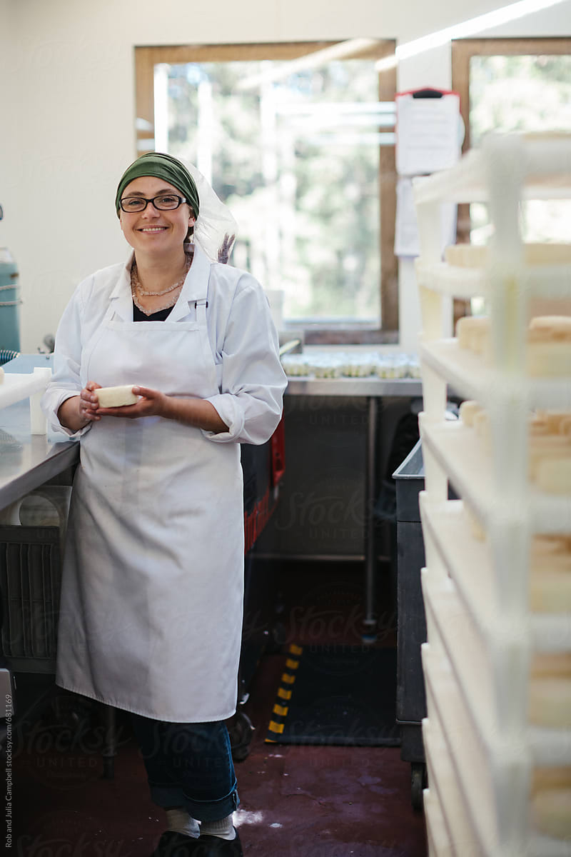 "Happy Portrait Of Woman Working In Cheese Kitchen" by Stocksy ...