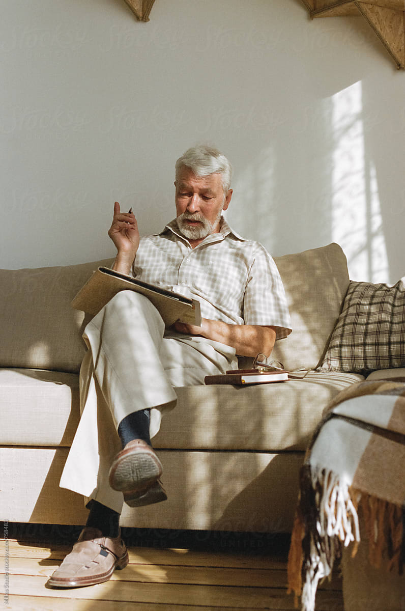 "Senior Man At Home" by Stocksy Contributor "Milles Team" - Stocksy