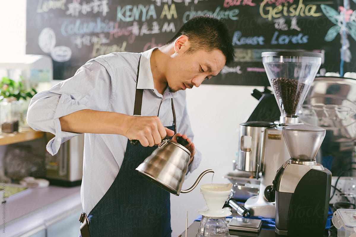 "Young Man Preparing Coffee" by Stocksy Contributor "MaaHoo" - Stocksy