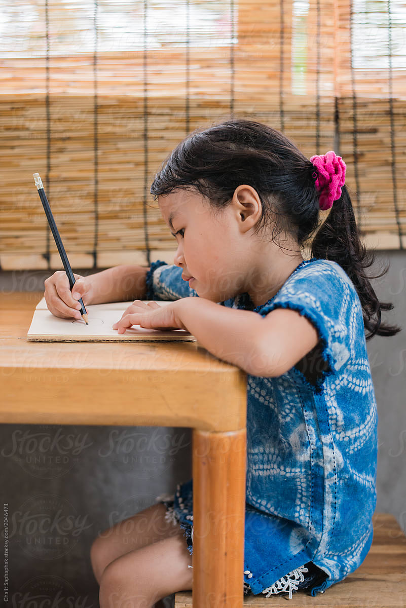 "Asian Children Drawing" by Stocksy Contributor "Chalit Saphaphak ...