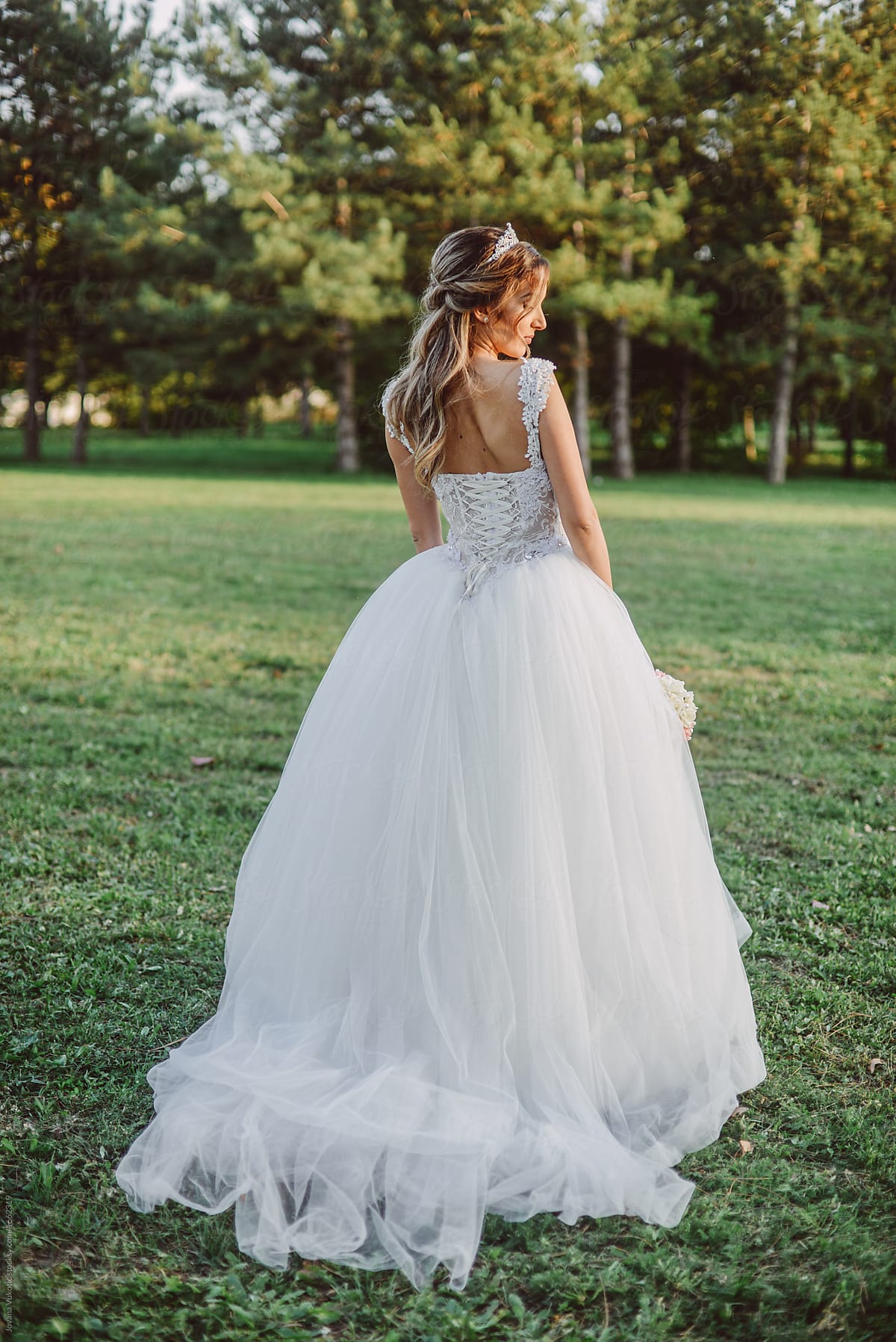 "Bride From The Back" by Stocksy Contributor "Jovana Vukotic" - Stocksy