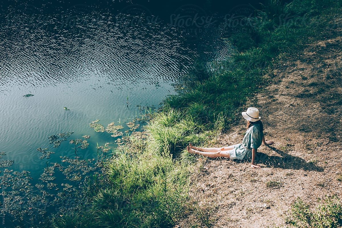 "Young Woman Looking At The Water In A Lake" by Stocksy Contributor ...