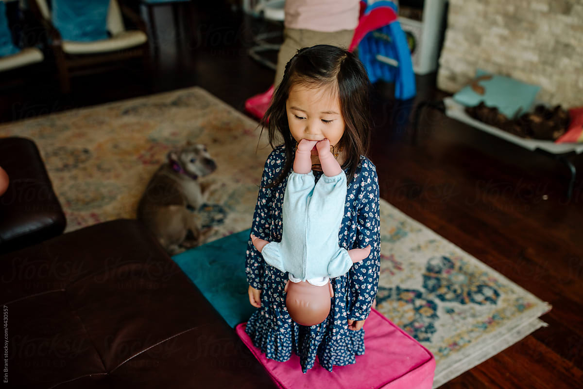  Funny Portrait Of Toddler Being Silly In Her Home By Stocksy