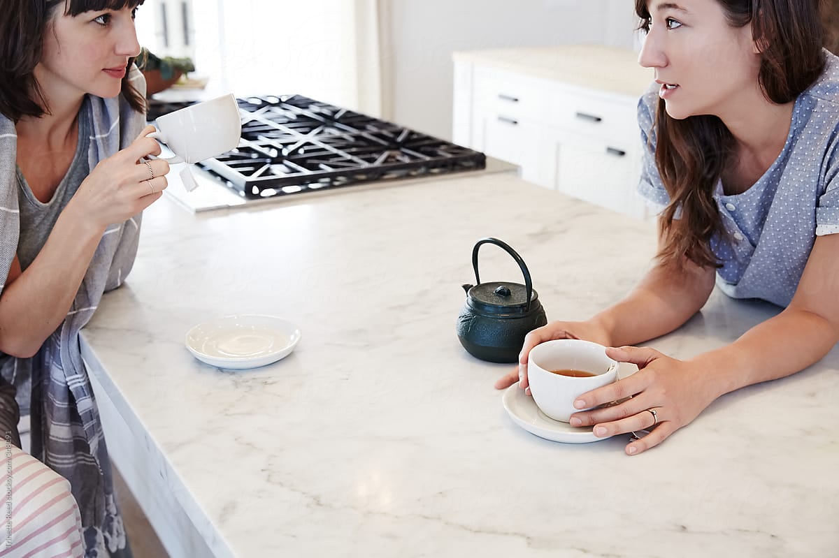 "Friends Having Tea In Kitchen Of Modern Design Farmhouse" by Stocksy ...
