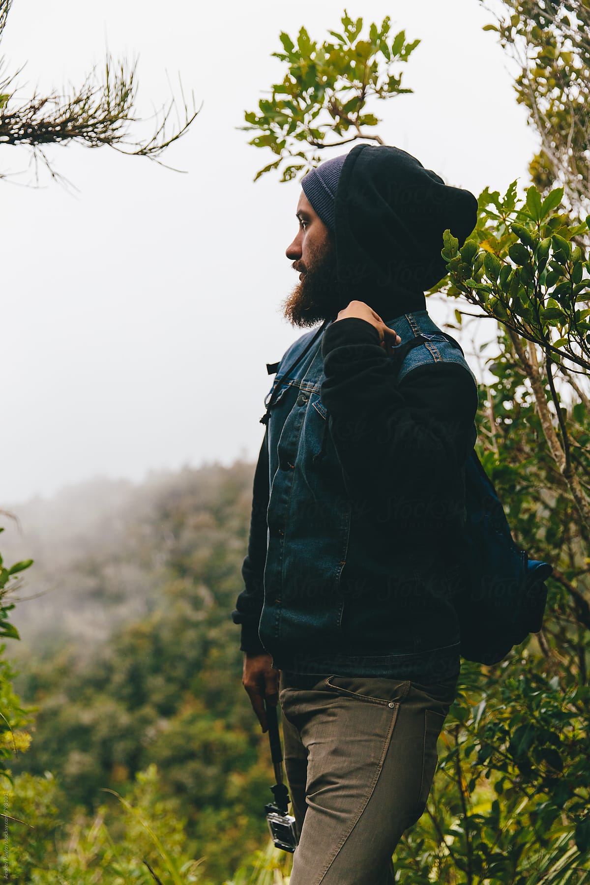 "Man Looking At Forest" by Stocksy Contributor "Andrey Pavlov" - Stocksy