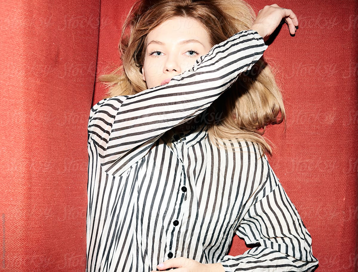 "Young Casual Model Lying On Sofa" by Stocksy Contributor "Guille ...