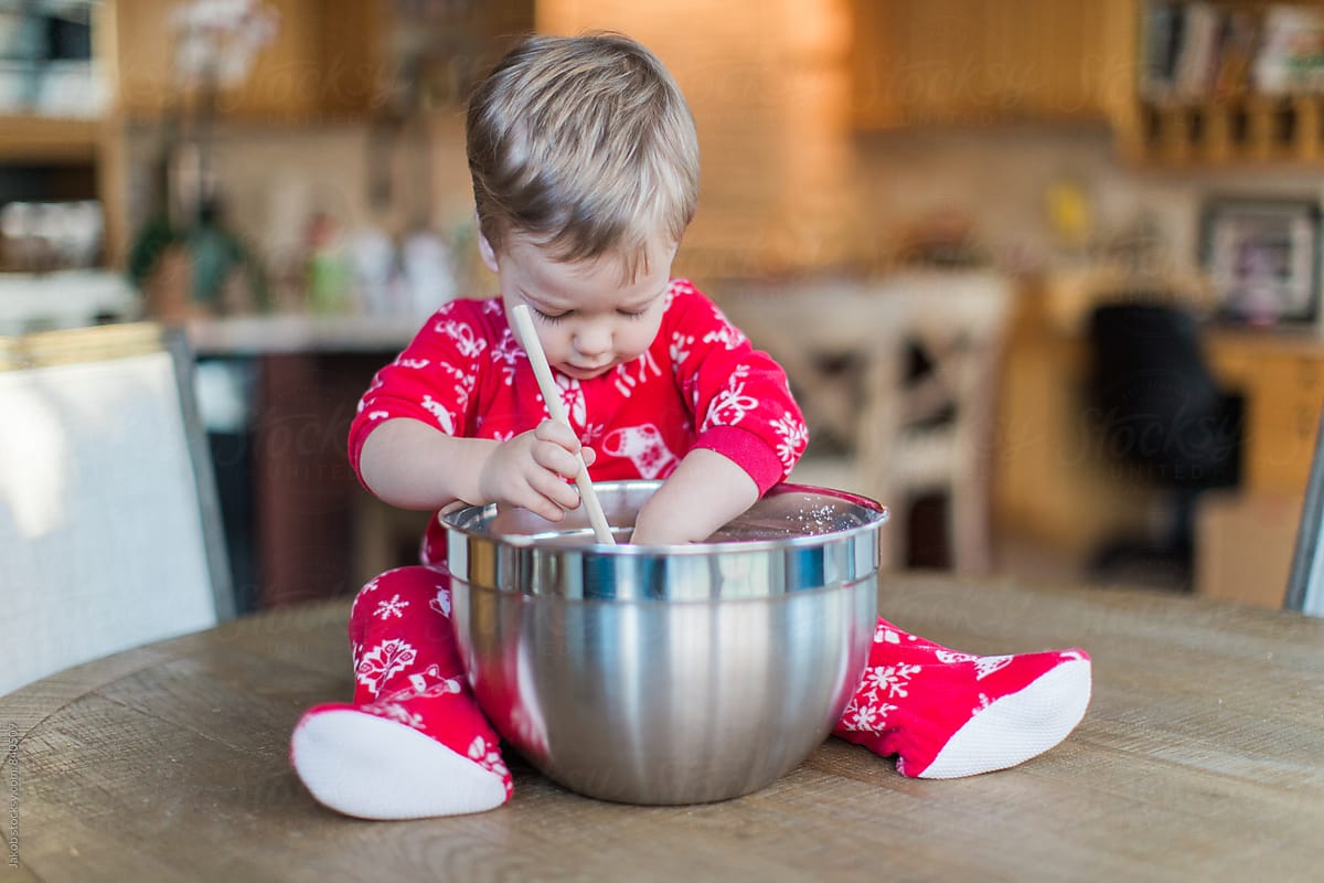 "Cute Young Boy Stirring A Large Bowl" by Stocksy Contributor "Jakob ...
