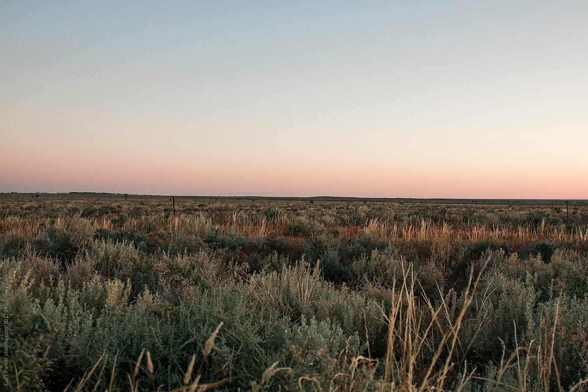 "Sunset In An Open Australian Desert" by Stocksy Contributor "Gary ...