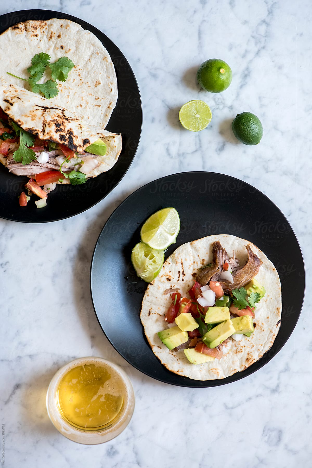 "Carnitas Tacos" by Stocksy Contributor "Ivan Solis" - Stocksy