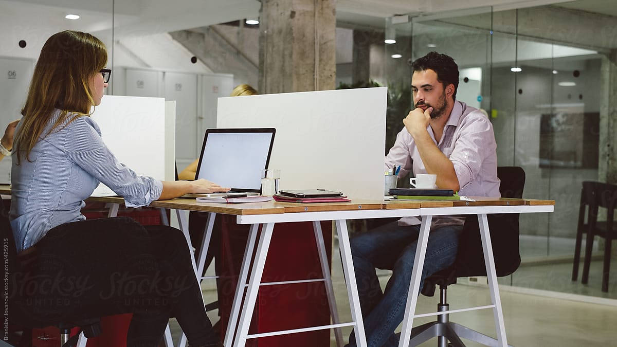 "People Sitting At Their Desks At The Office" by Stocksy Contributor "B ...