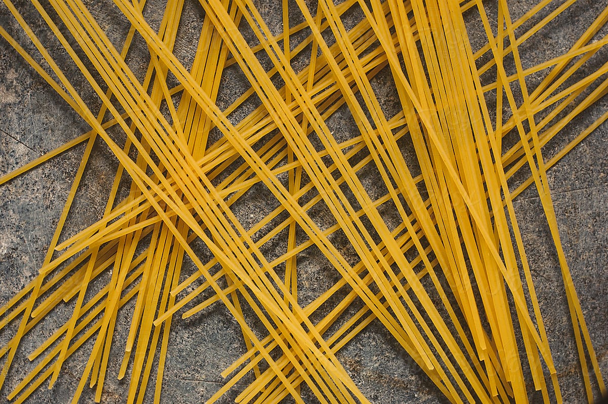 "Dry Spaghetti" by Stocksy Contributor "Gabi Bucataru" - Stocksy