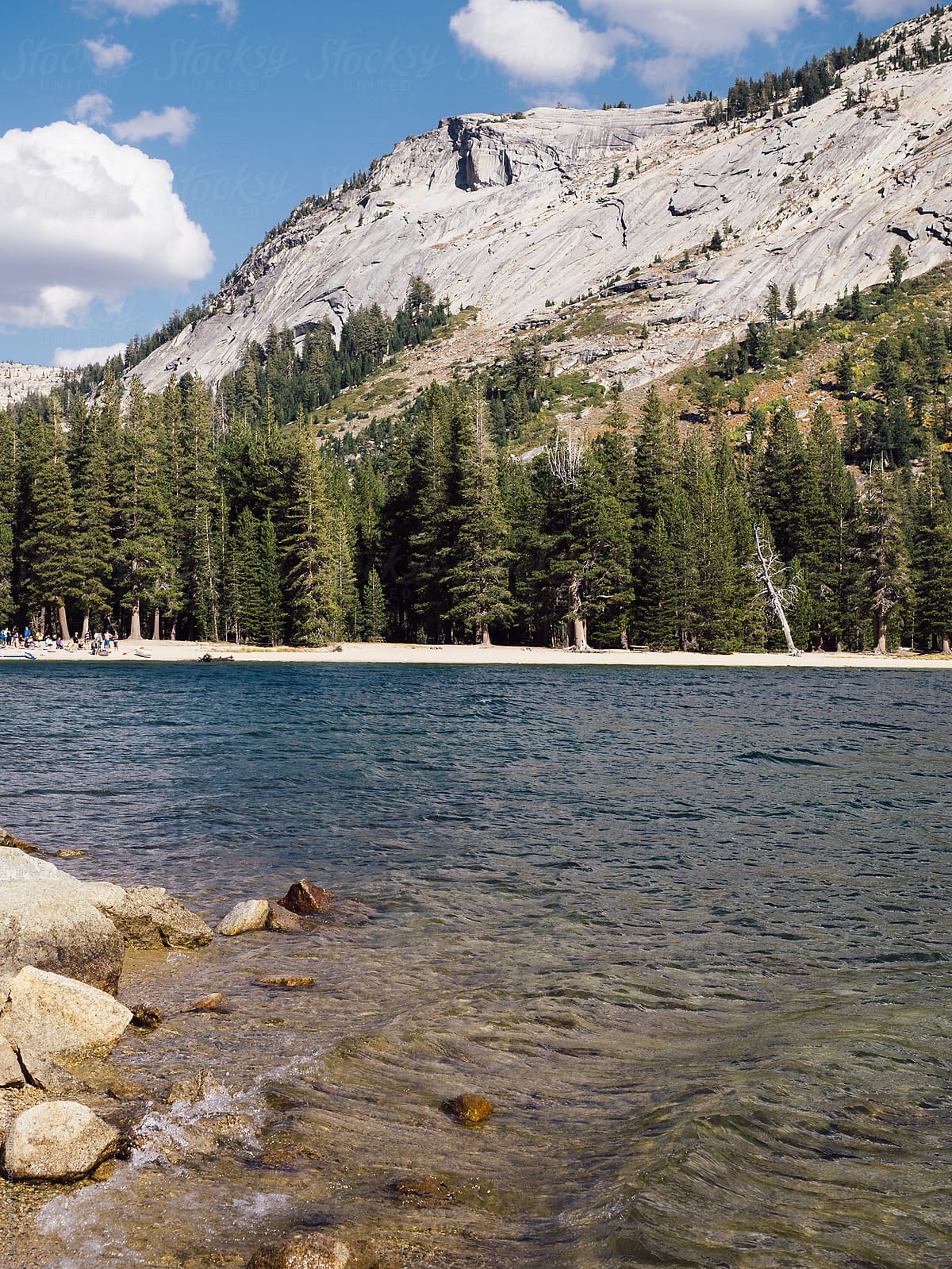 "Choppy Lake Water With Pine Trees And Granite Formation From Shore" by ...