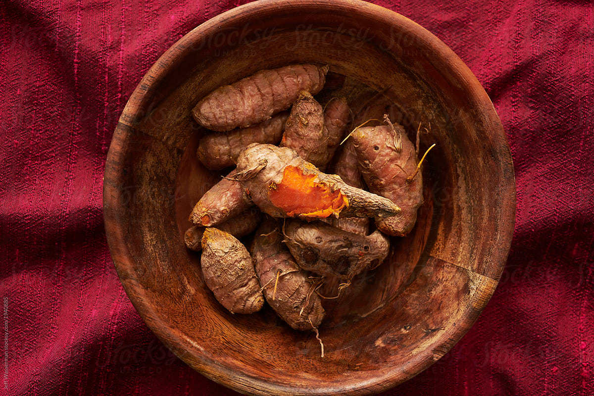 "Raw Turmeric" by Stocksy Contributor "Jeff Wasserman" - Stocksy