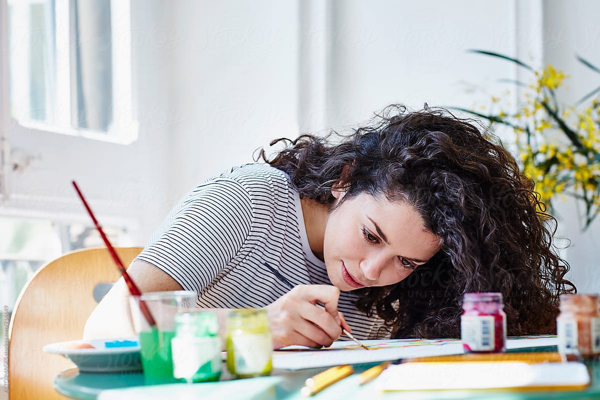 "Woman Drawing At Table In House" by Stocksy Contributor "ALTO IMAGES ...