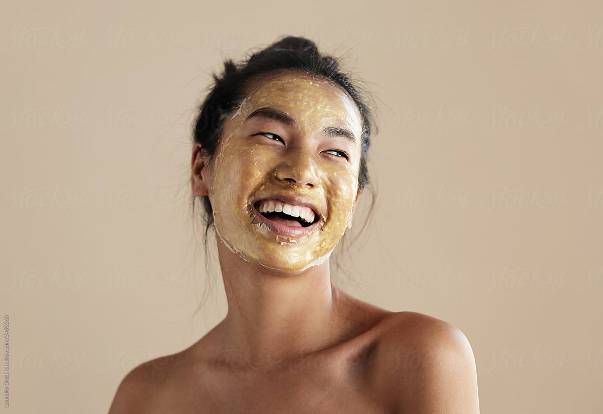 "Happy Woman With Golden Facial Mask" by Stocksy Contributor "Leandro ...