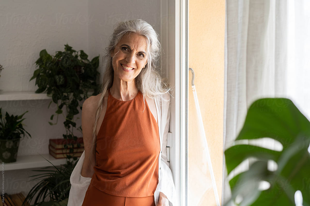 "Happy Retired Woman Portrait" by Stocksy Contributor "Alba Vitta ...