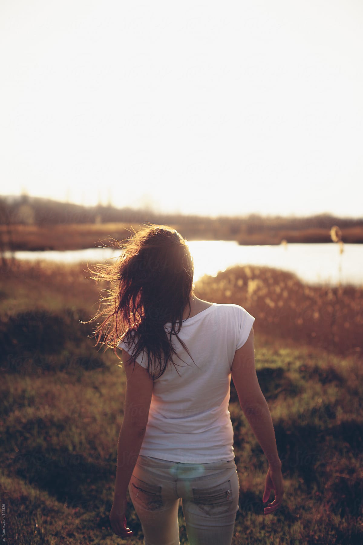 "Young Woman Walking Outside" by Stocksy Contributor "Paff" - Stocksy