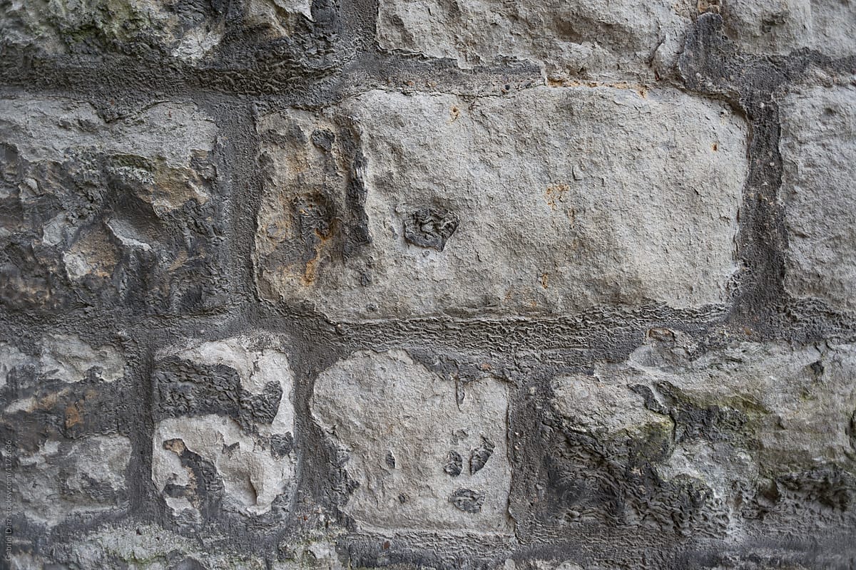 "Stacked Stone Wall." by Stocksy Contributor "Gabriel J. Diaz" - Stocksy
