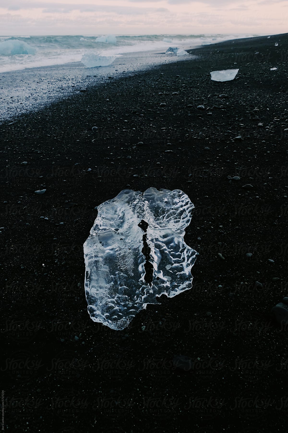 "Ice On A Black Beach" by Stocksy Contributor "Bor Cvetko" - Stocksy