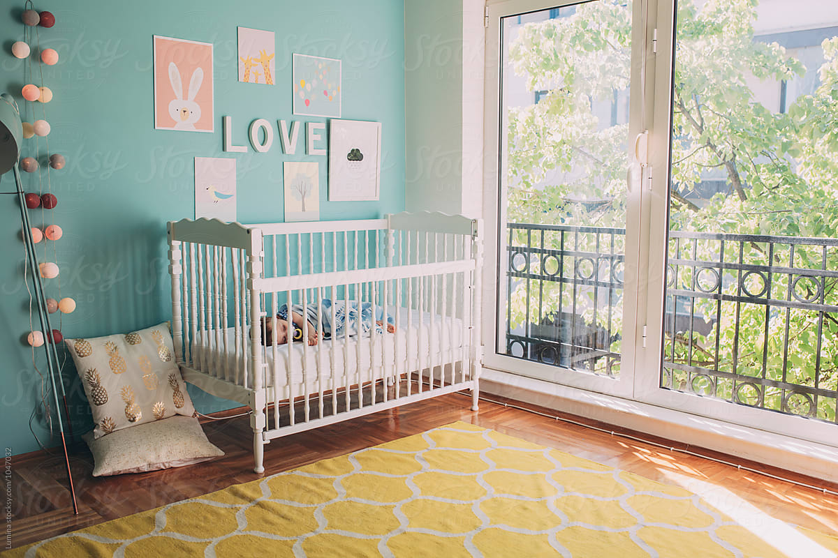 "Baby Sleeping In A Crib In Nursery" by Stocksy Contributor "Lumina ...