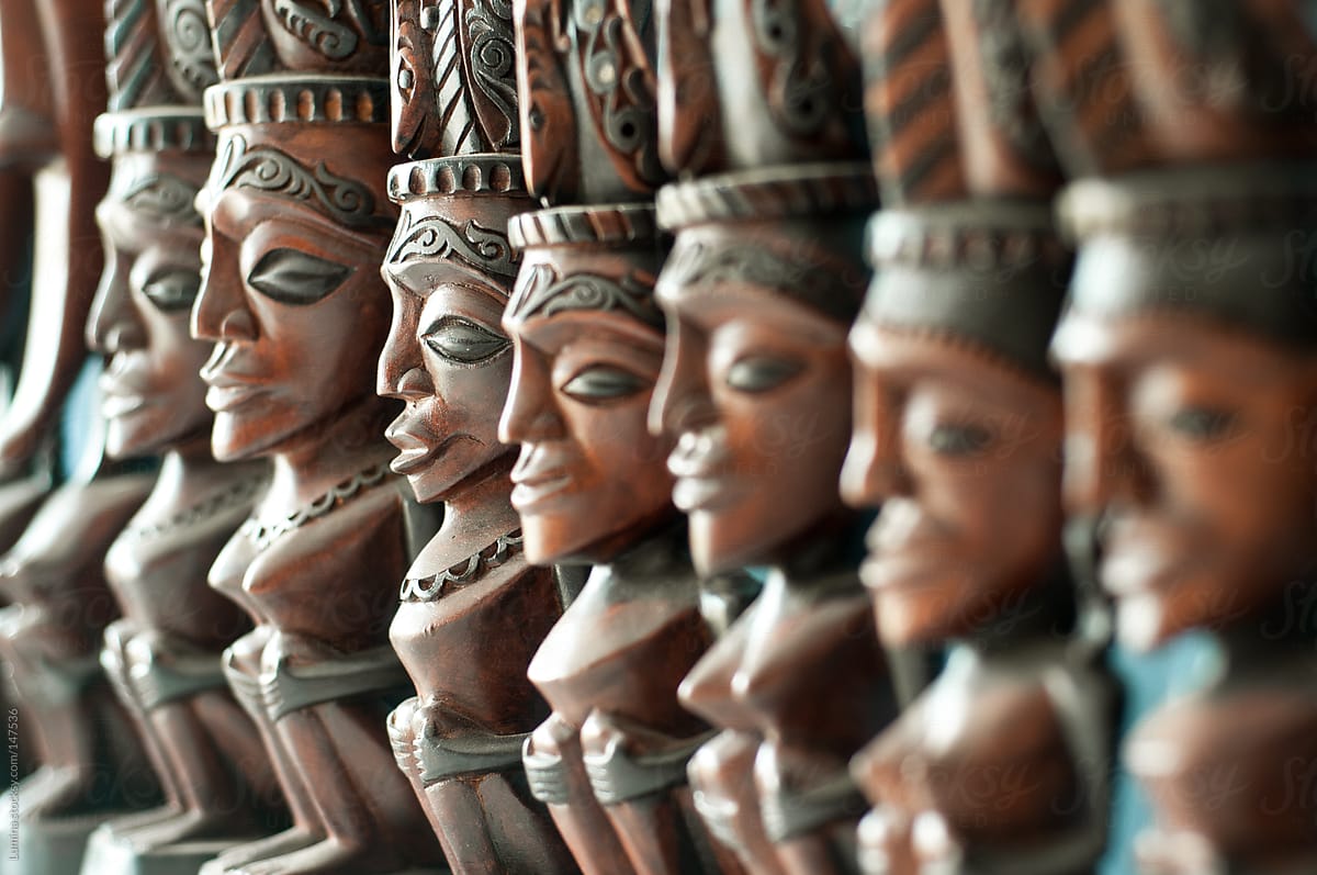 "Wooden Statuettes" by Stocksy Contributor "Lumina" - Stocksy