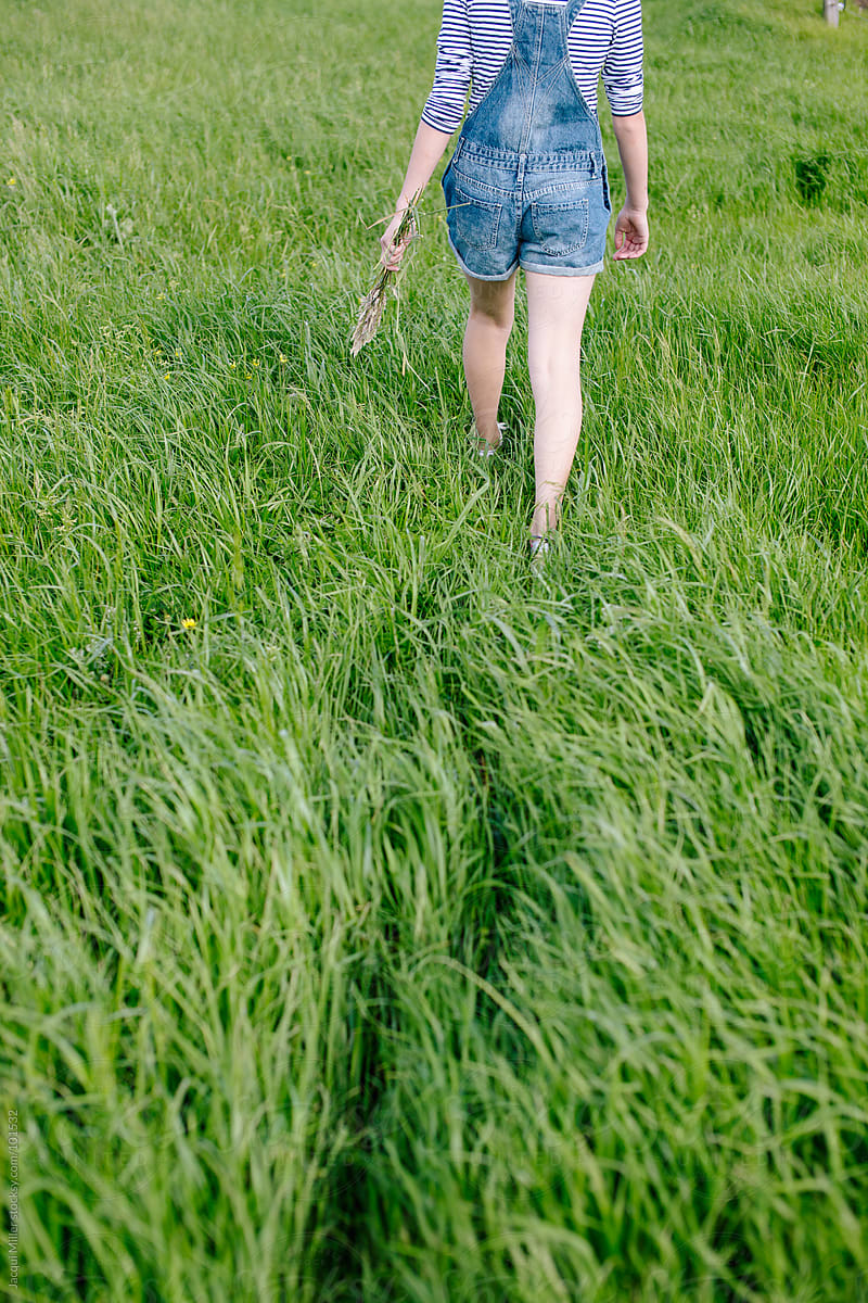"Walking In Green Fields" by Stocksy Contributor "Jacqui Miller" - Stocksy