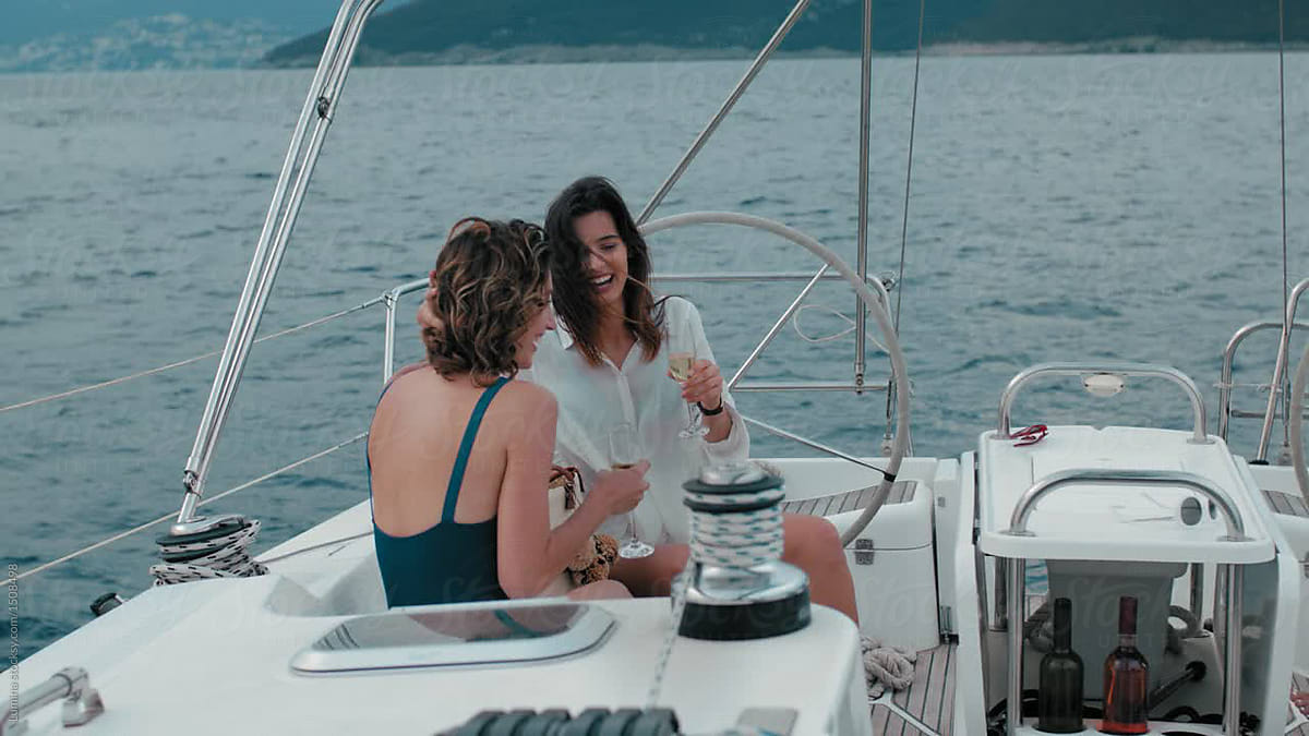 "Girlfriends Enjoying On Sailing Boat" by Stocksy Contributor "Lumina ...
