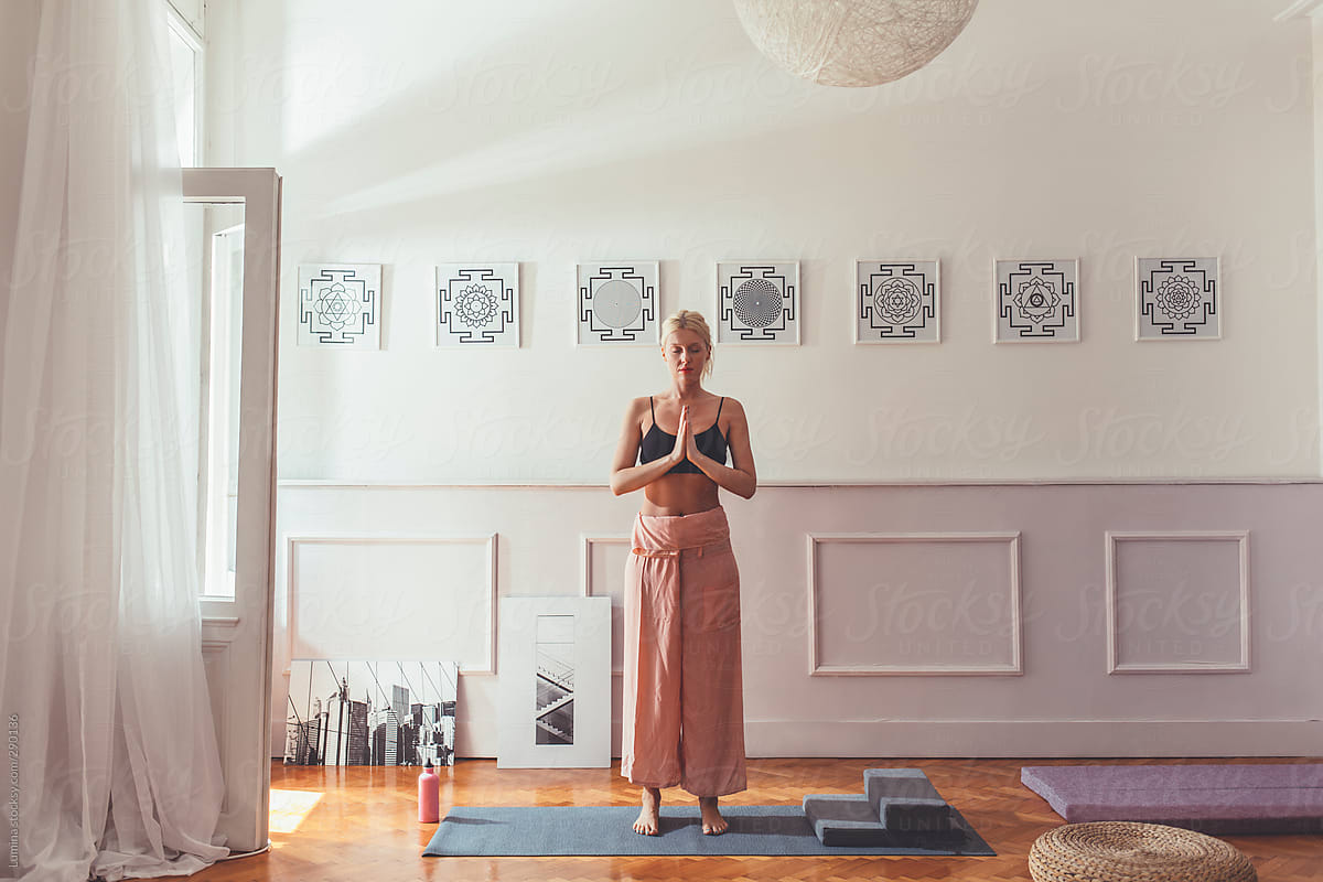 "Standing Meditation" by Stocksy Contributor "Lumina" - Stocksy