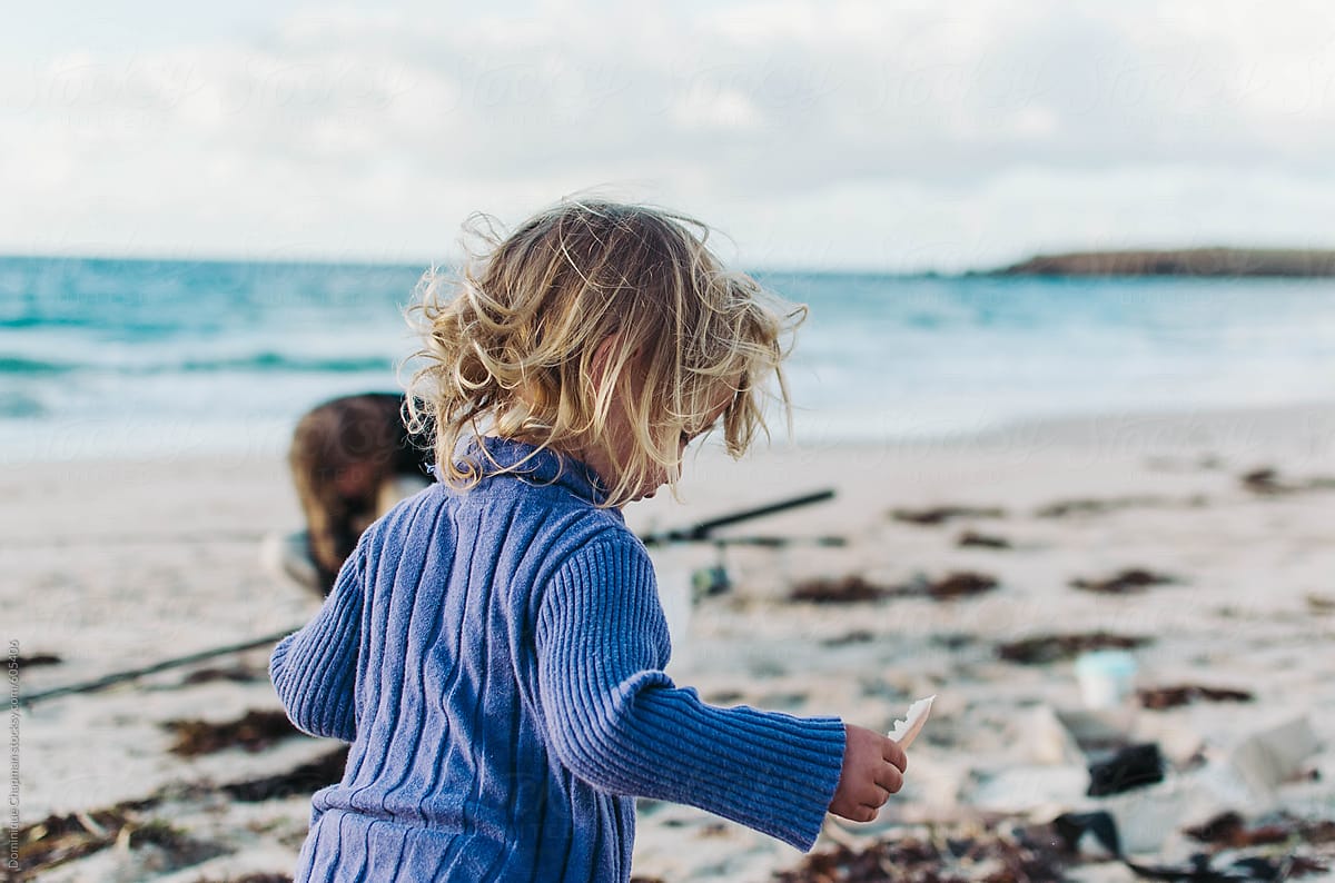 "Little Girl Playing On Beach" by Stocksy Contributor "Dominique ...