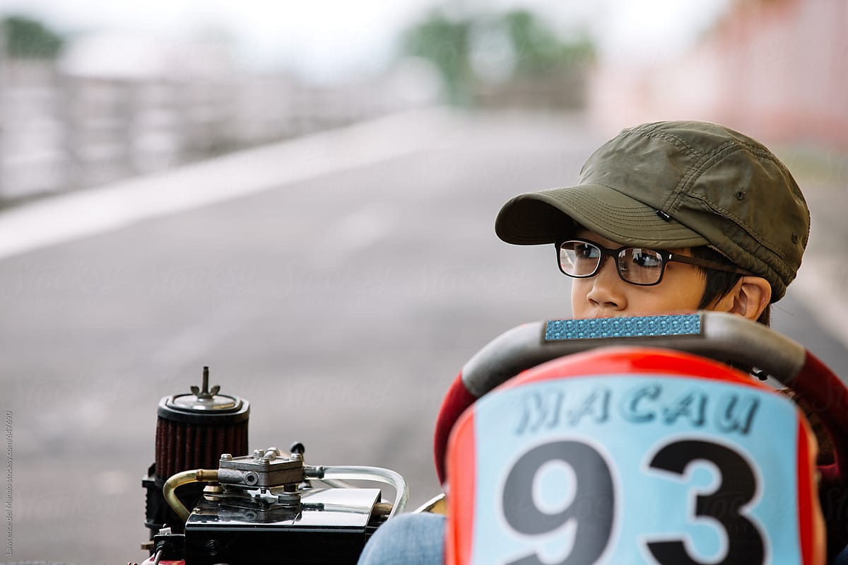 "Young Boy Listening To Instructions Before Suiting Up For Race ...