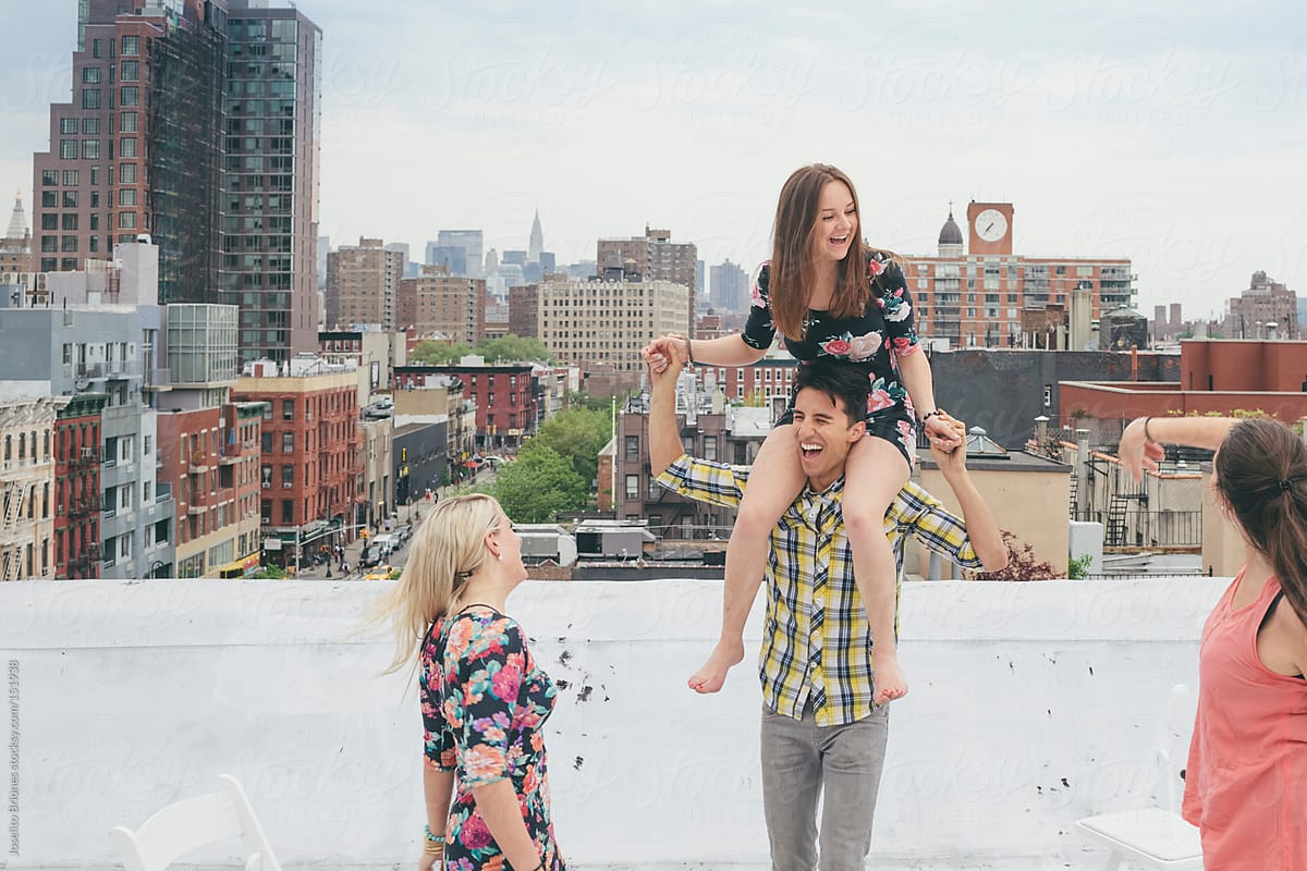 "Friends Having Fun And Dancing On A New York Rooftop" by Stocksy ...